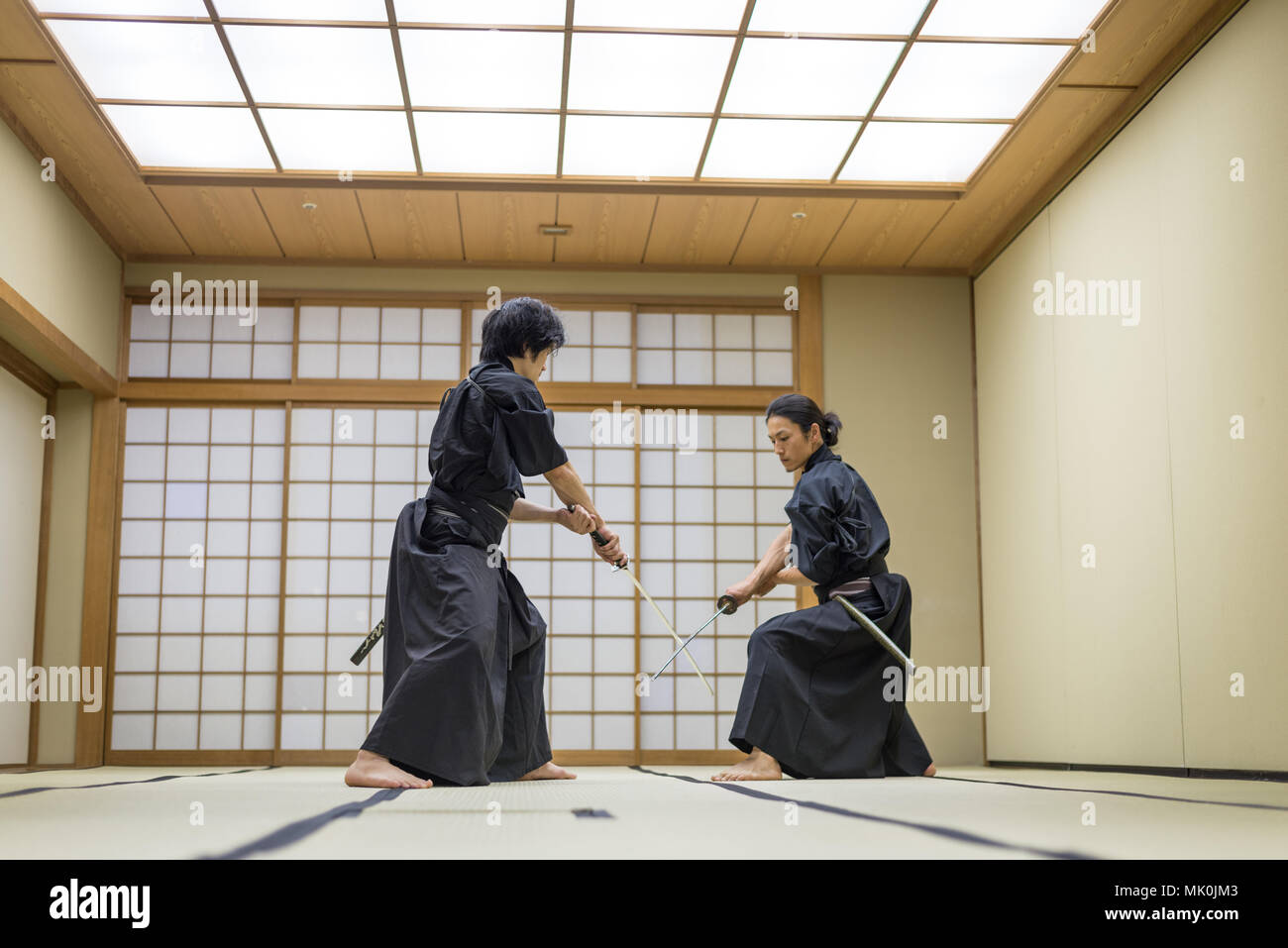 Japanese martial arts athlete training kendo in a dojo - Samaurai ...