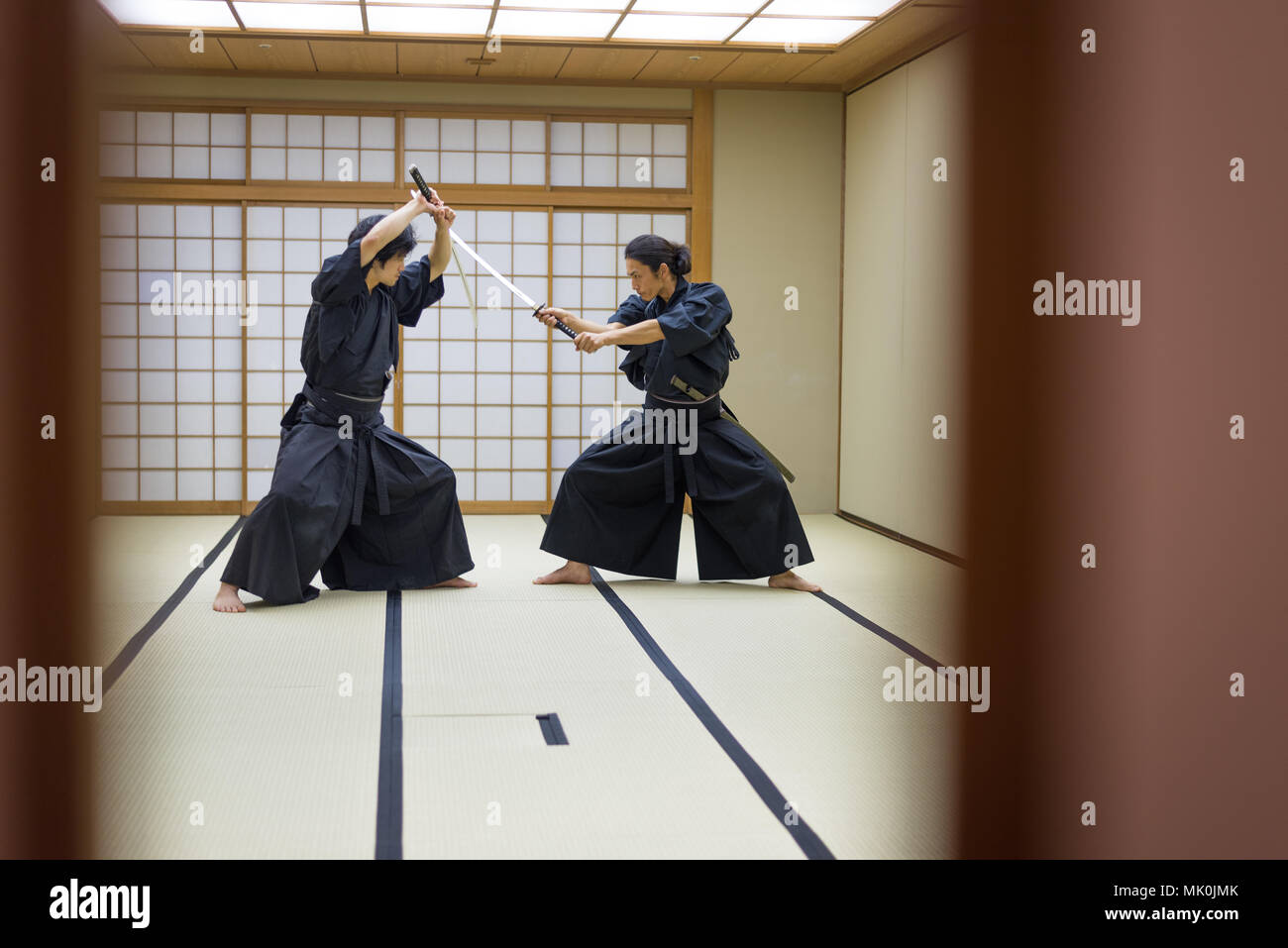 Japanese martial arts athlete training kendo in a dojo - Samaurai ...