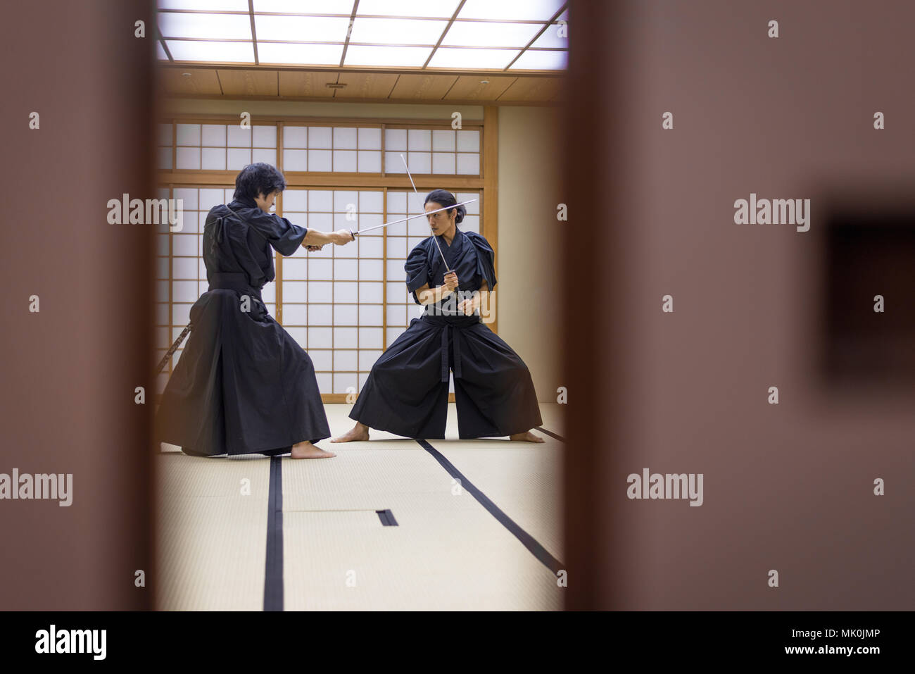 Japanese martial arts athlete training kendo in a dojo - Samaurai ...