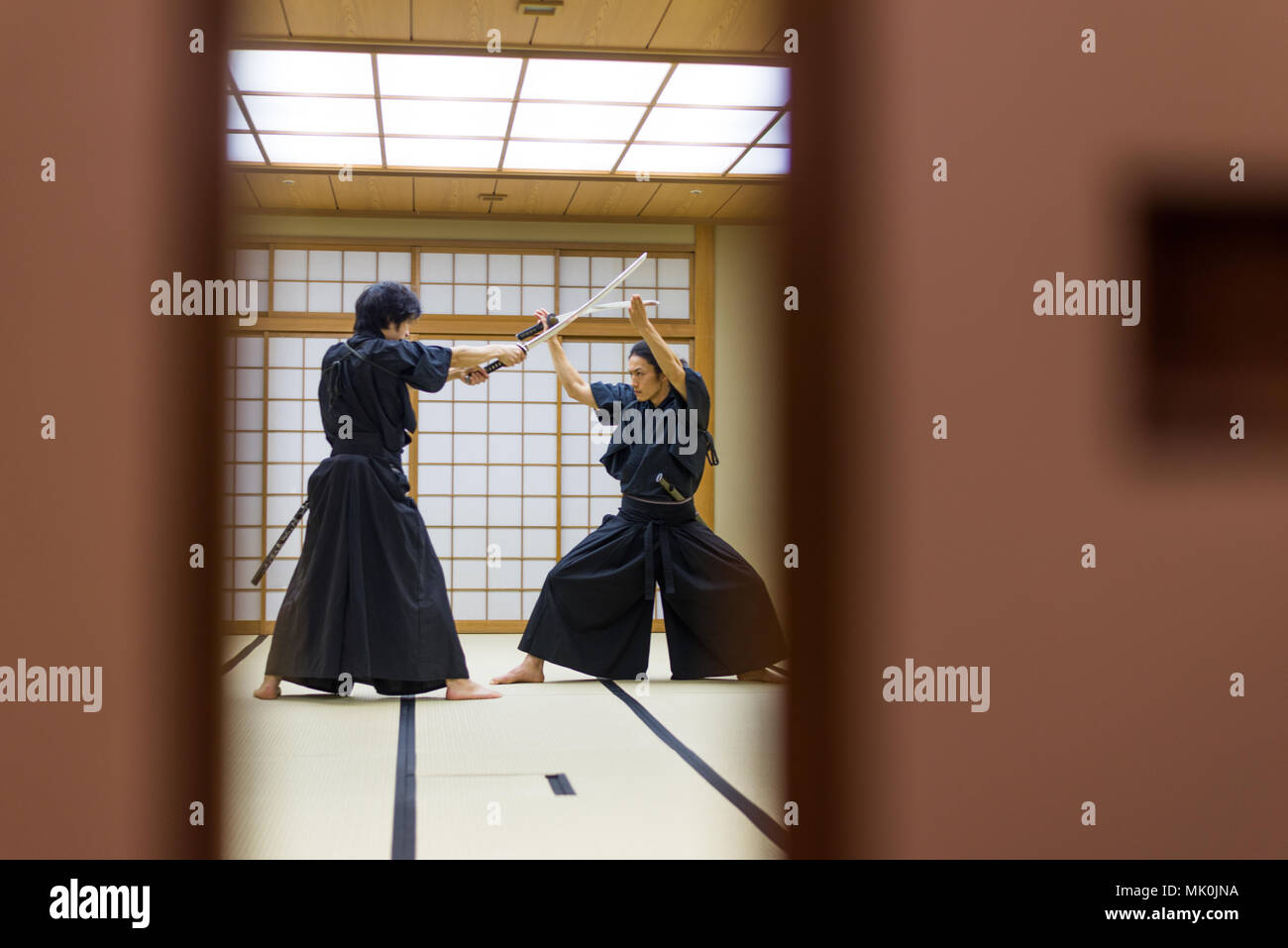 Japanese martial arts athlete training kendo in a dojo - Samaurai ...