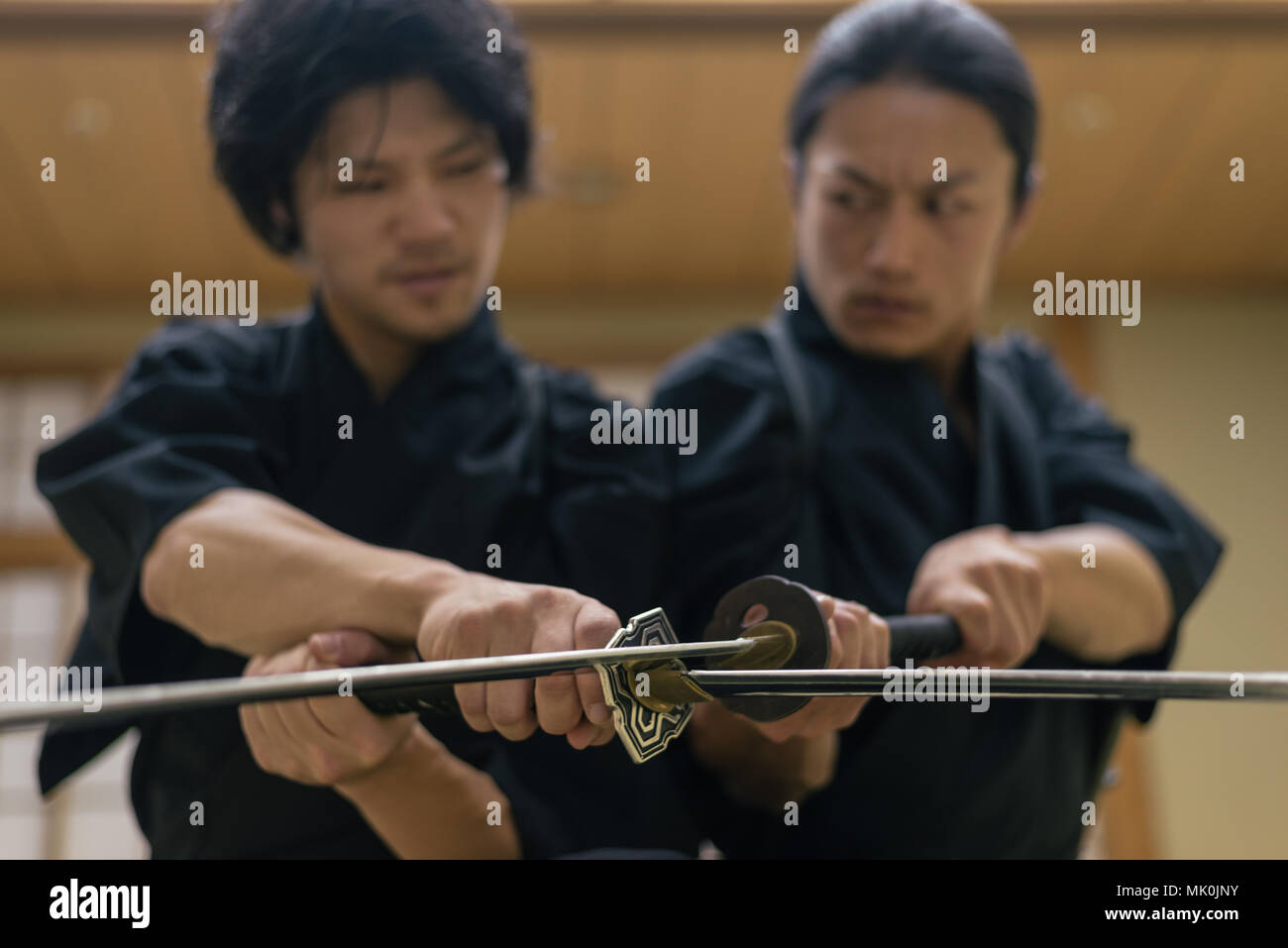 Japanese martial arts athlete training kendo in a dojo - Samaurai ...