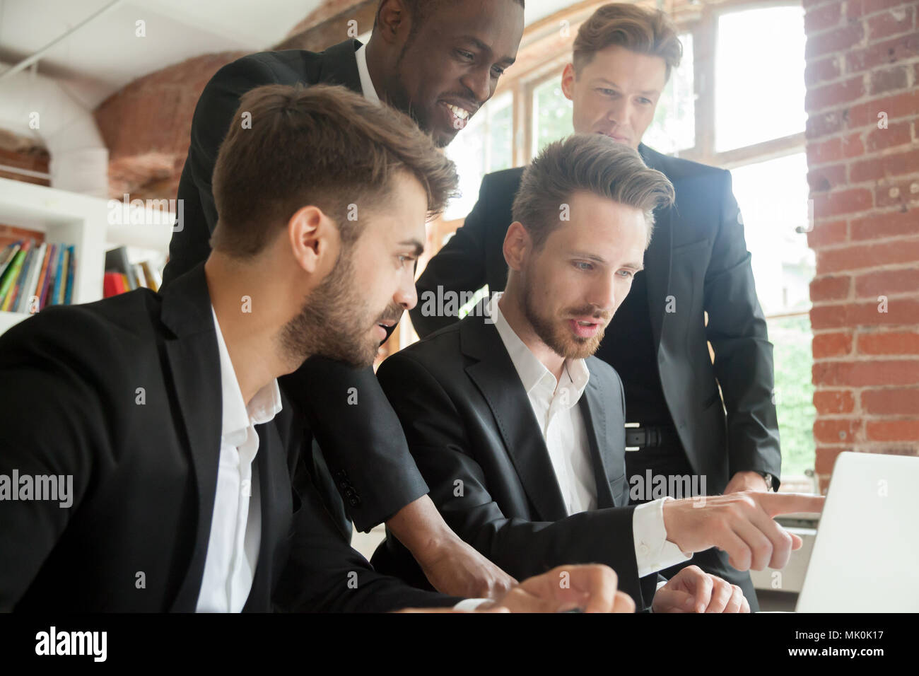 Male company executive presenting growing income to colleagues Stock ... Male company executive presenting growing income to colleagues Stock ...