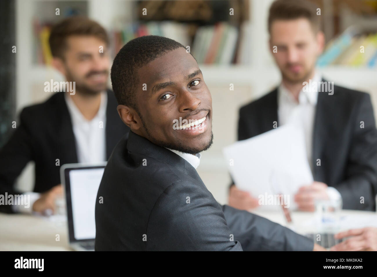 Manager looking over shoulder hi-res stock photography and images - Alamy