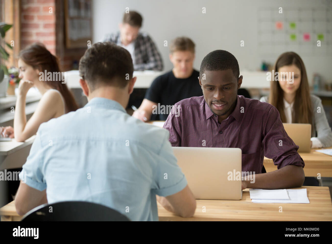 Reading computer interested hi-res stock photography and images - Alamy