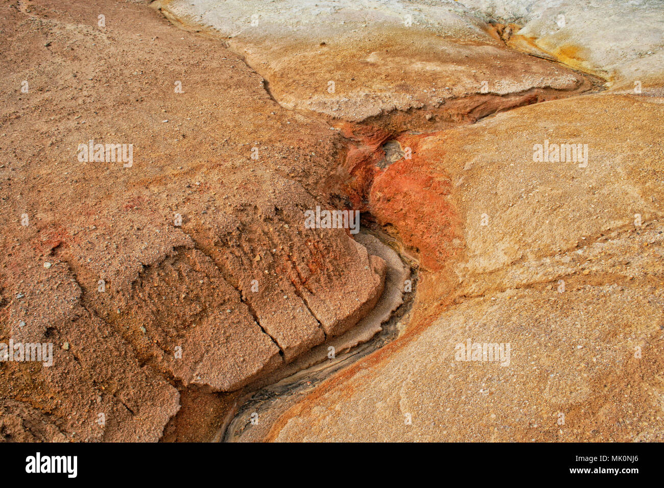 Volcanic landscape with rusty earth and crack in iceland Stock Photo ...
