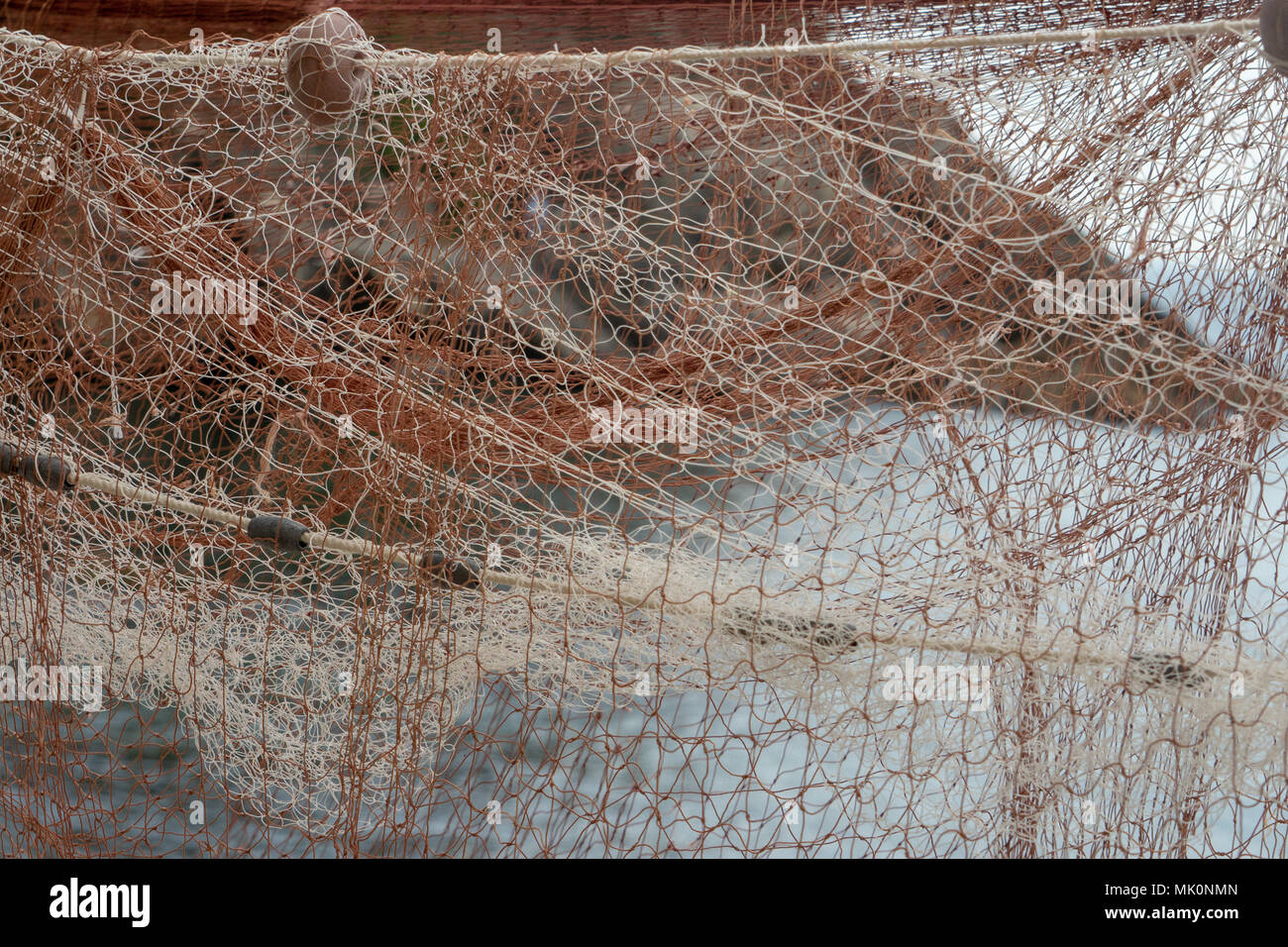 Fishing fisherman net hanging detail close up Stock Photo - Alamy