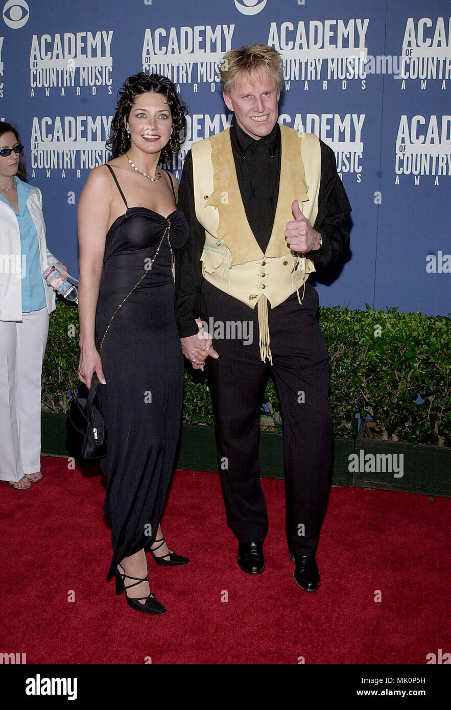 Gary Busey and wife Jenny Warden arrive at the 36th Academy of Country ...