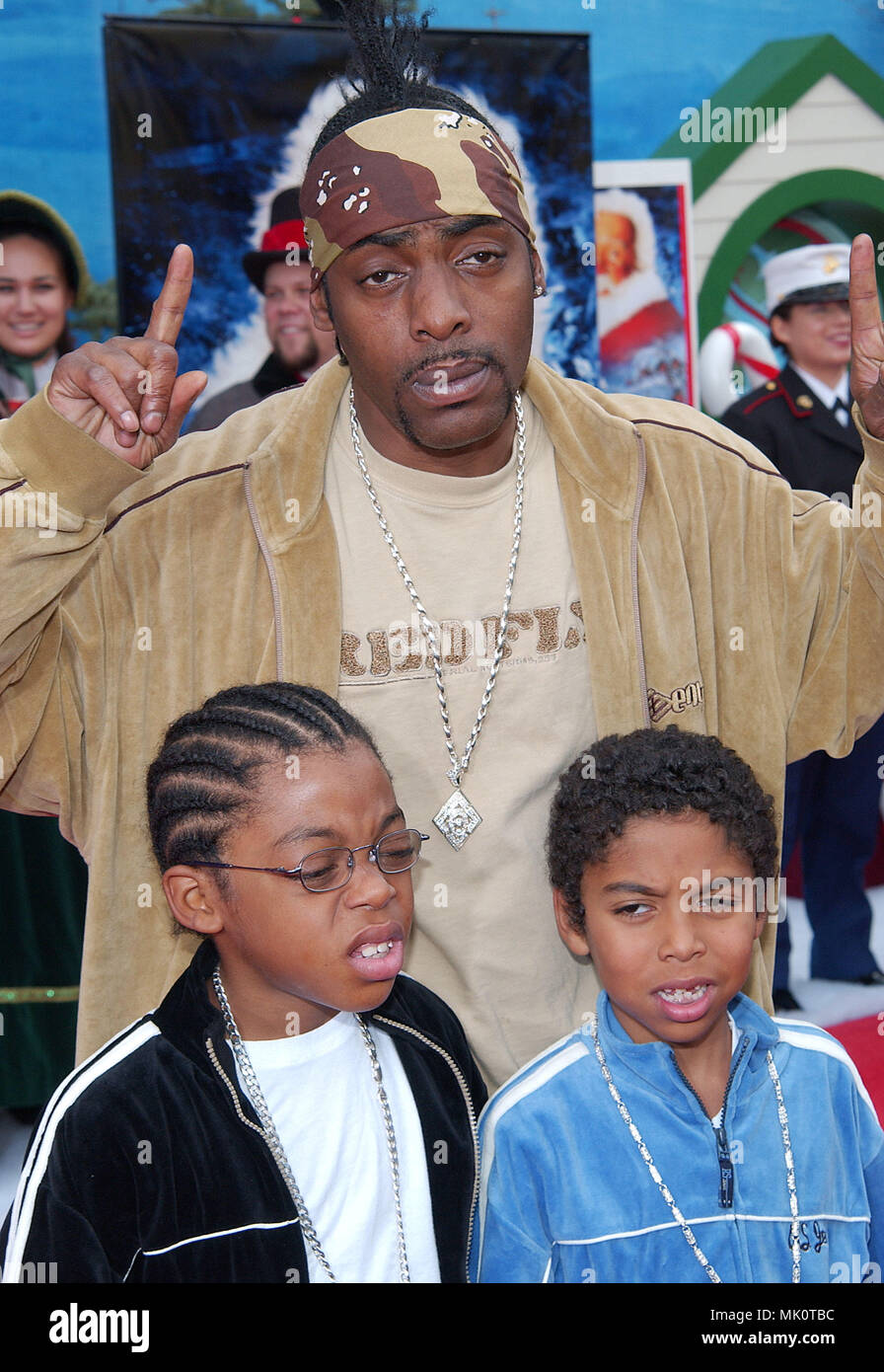 Coolio and kids arriving at the Santa Clause 2 premiere at the El ...