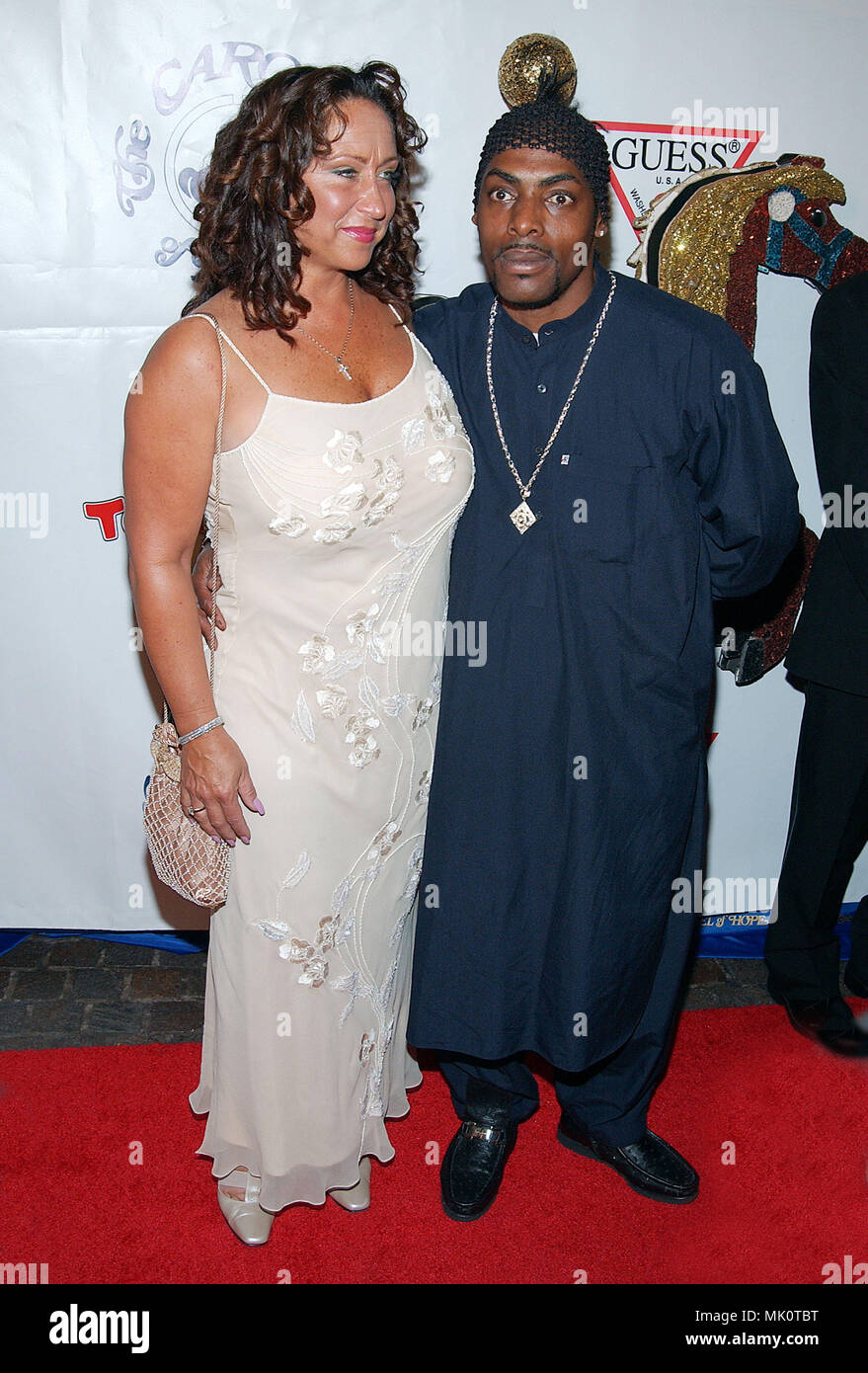 Coolio and wife arriving at the Carousel of Hope which support the ...