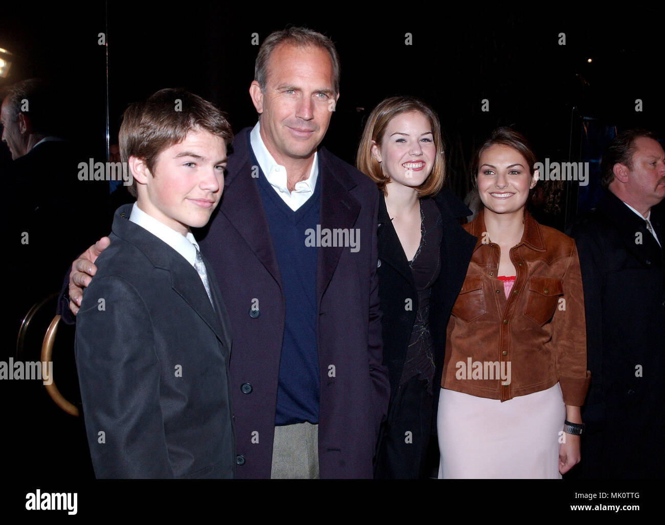 Kevin Costner posing with family at the DragonFly premiere at the ...