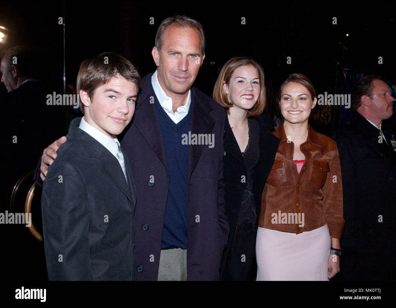 Kevin Costner posing with family at the DragonFly premiere at the ...