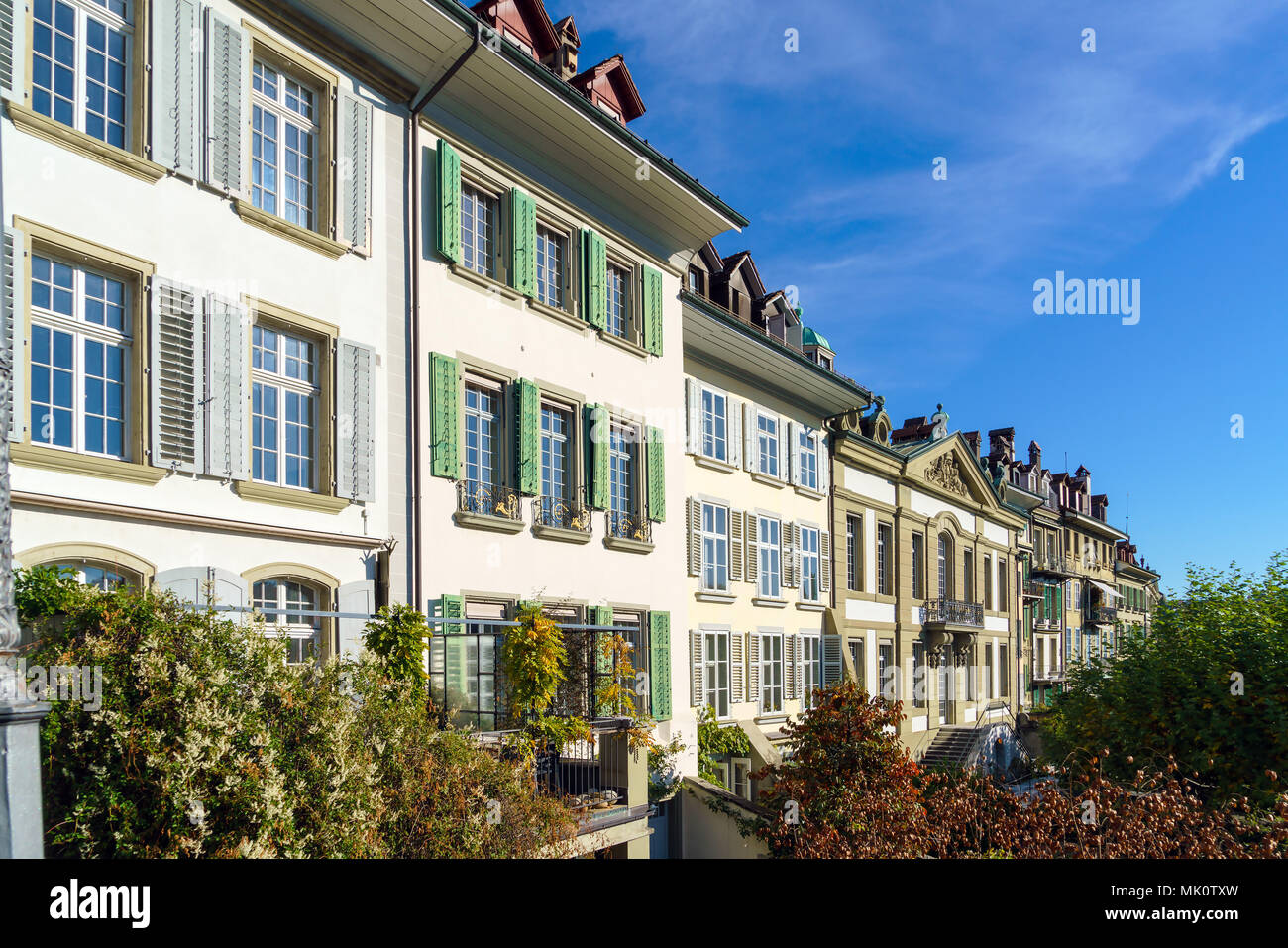 Beautiful traditional houses along the Aara river, Bern, Switzerland ...