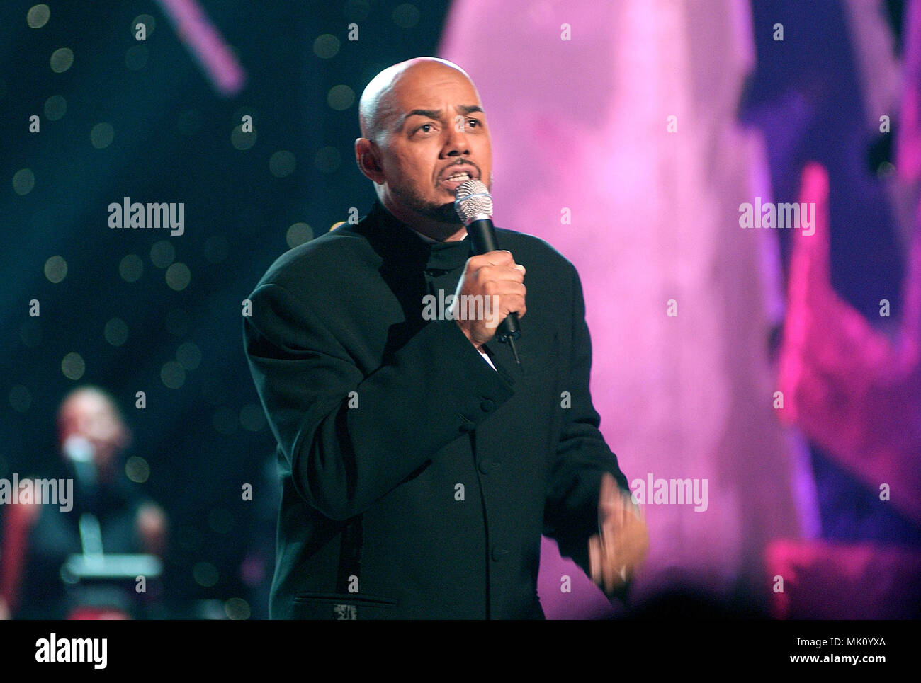 James Ingram performing at the 2001 Soul Train Christmas Starfest, in ...