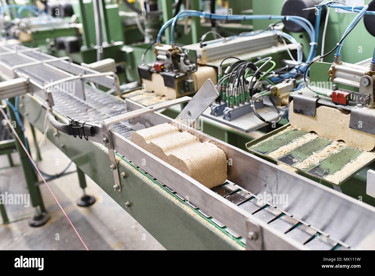 production of wood pellets in a wood processing factory and sawmill ...