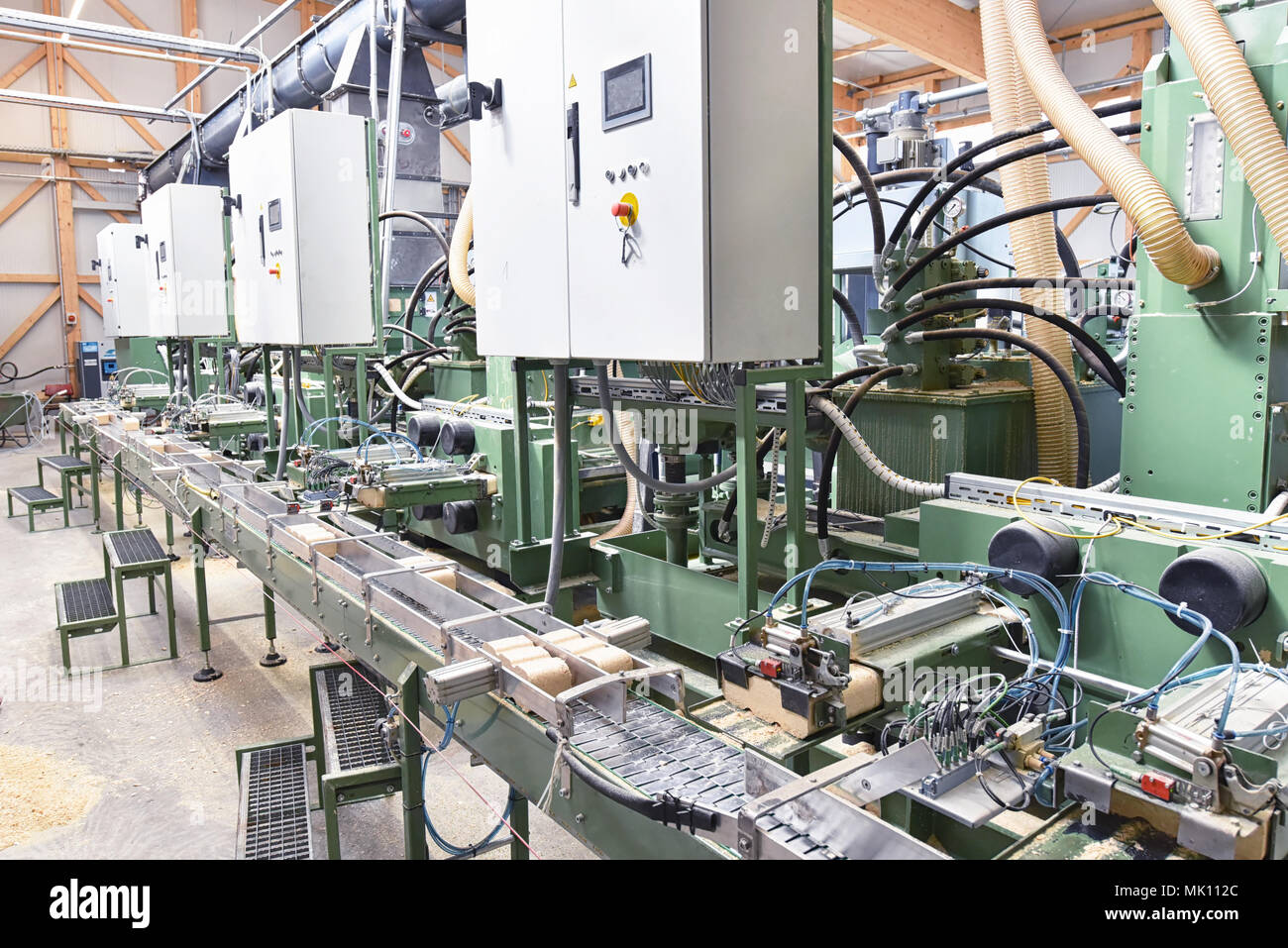 production of wood pellets in a wood processing factory and sawmill ...