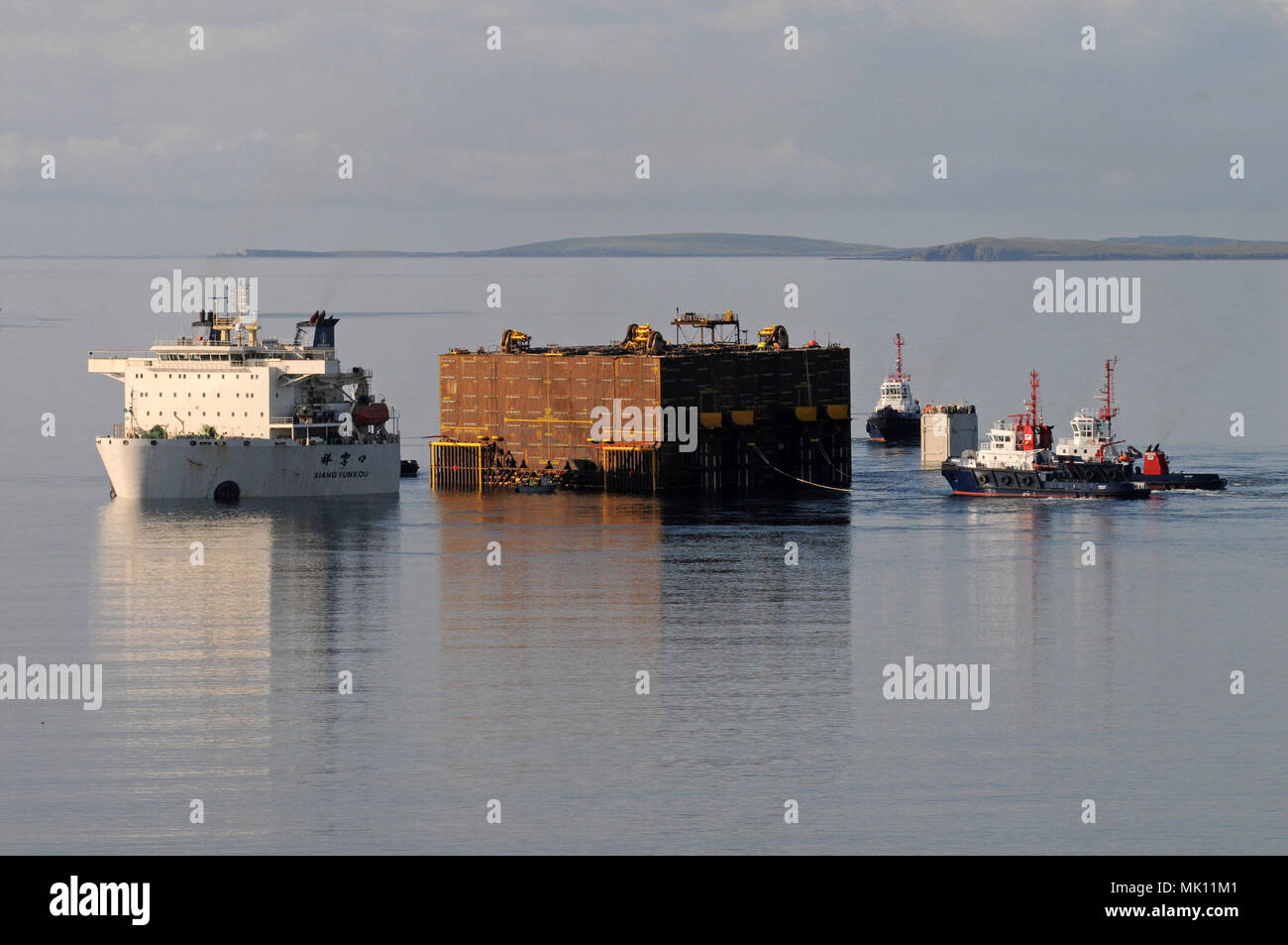 Heavy lifting vessel Xiang Yun Kou delivering a part of the Clair ridge ...