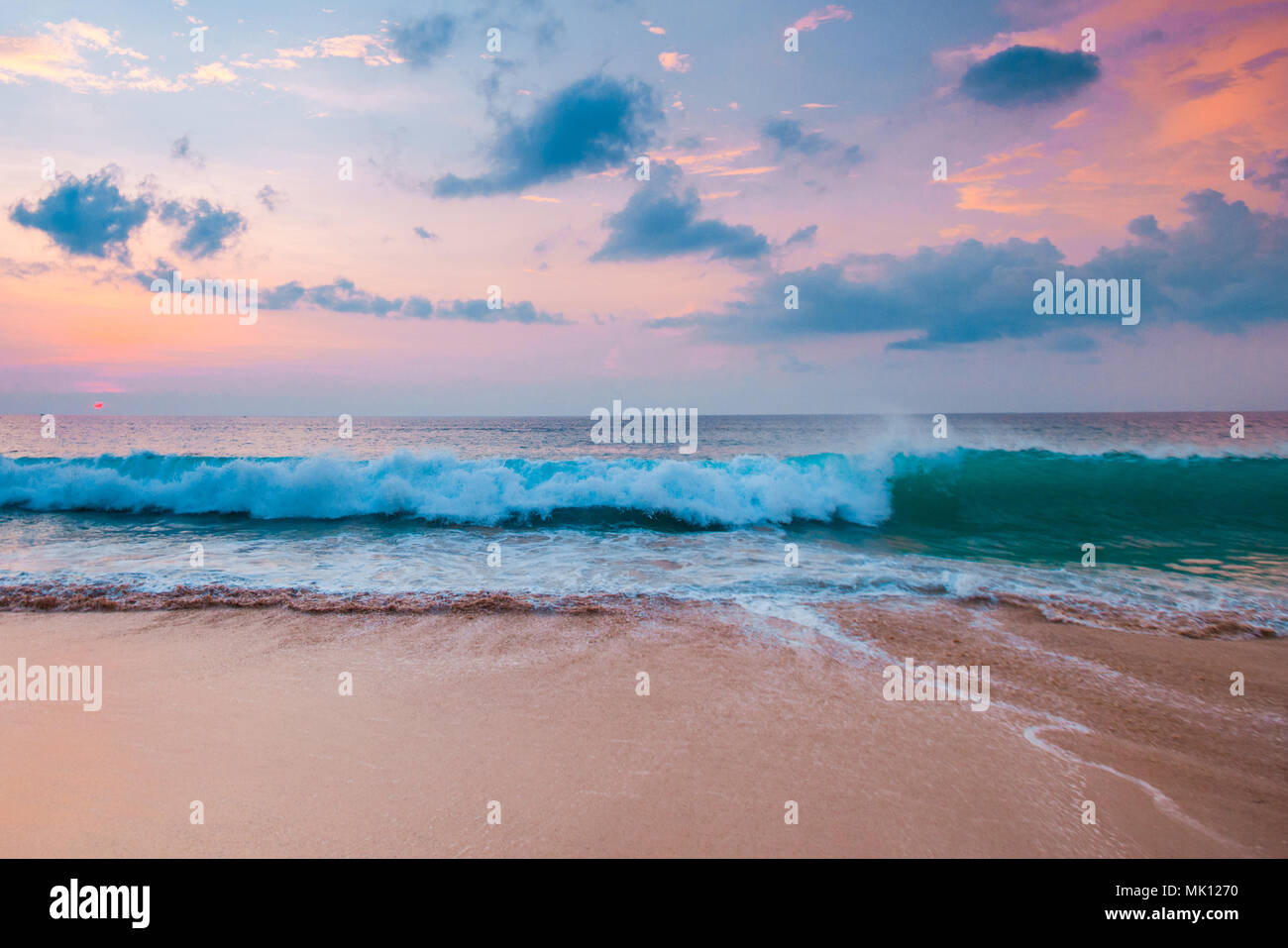 Radiant colorful sea beach sunset on Bali, Indonesia Stock Photo - Alamy