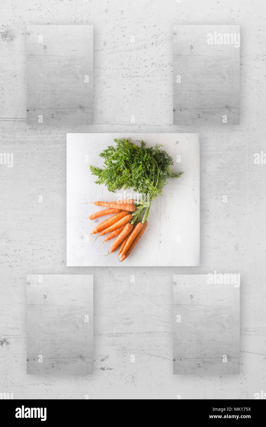 Top of view fresh carrot on white concrete background. Empty four ...