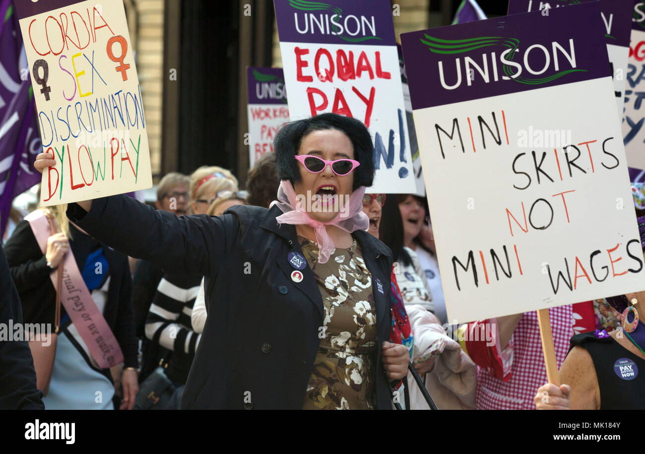 People take part in the annual May Day march in Glasgow during an ...