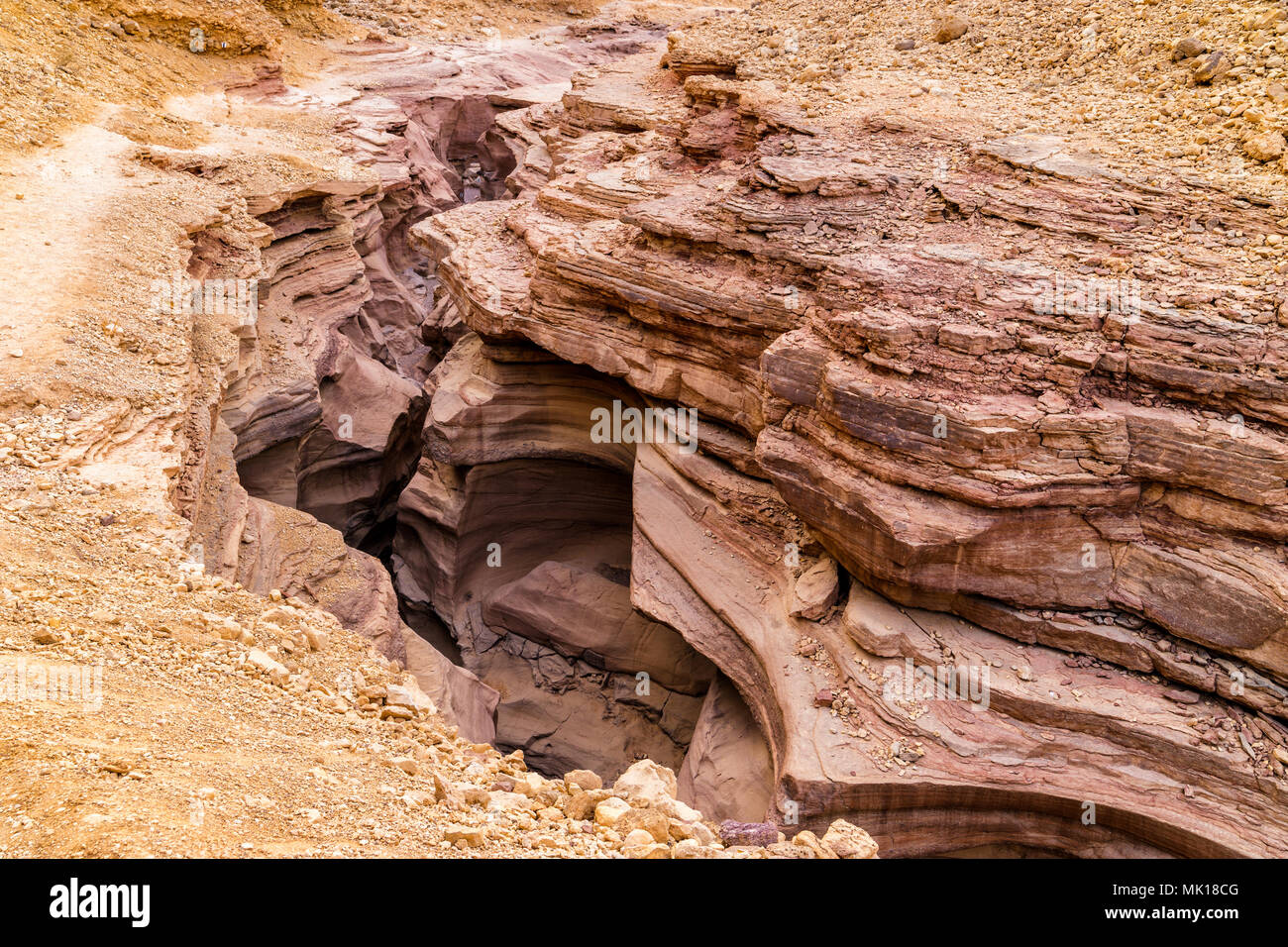 Waved and layered rocks and Red canyon from above, formed and eroded by ...
