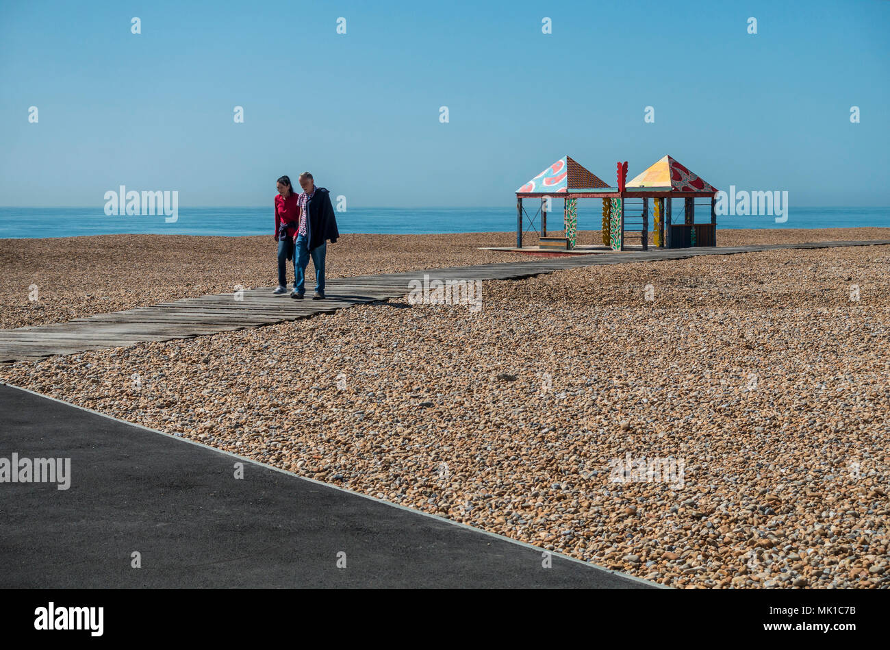 Couple Walking,Folkestone Beach,Folkestone,Kent,England Stock Photo - Alamy