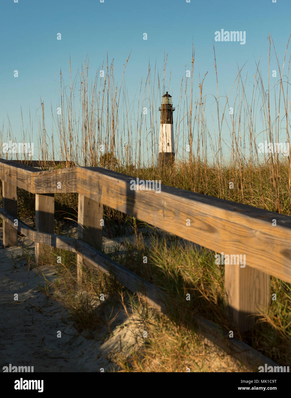 lighthouse beach scene on ocean shore beautiful landscape scene Stock ...