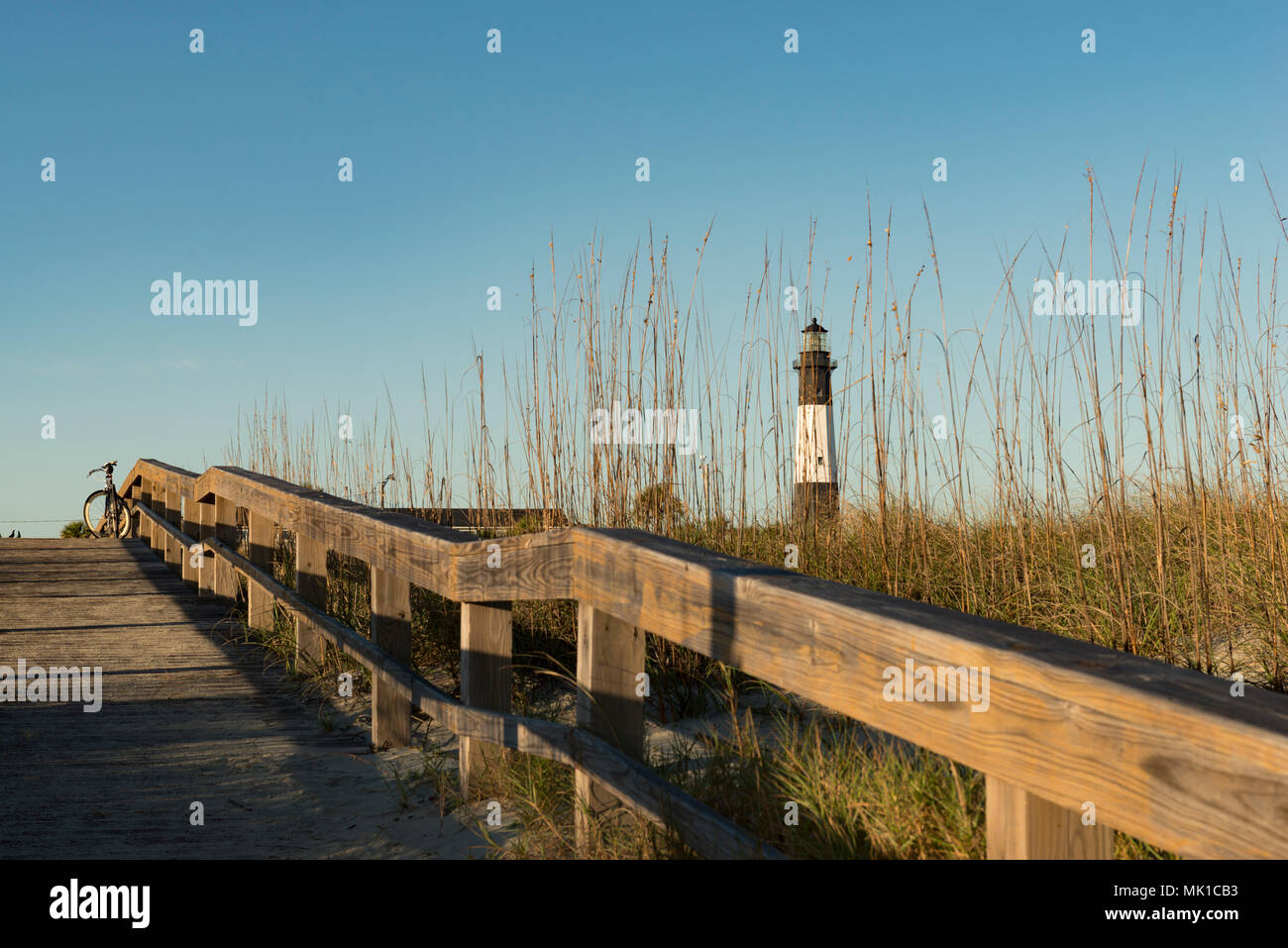 lighthouse beach scene on ocean shore beautiful landscape scene Stock ...