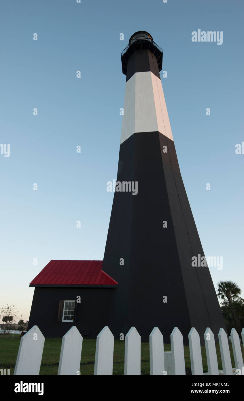 lighthouse beach scene on ocean shore beautiful landscape scene Stock ...