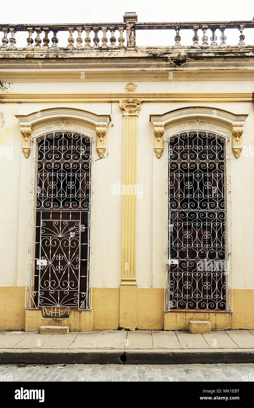 Typical Cuban palace window with iron protection grate Stock Photo - Alamy