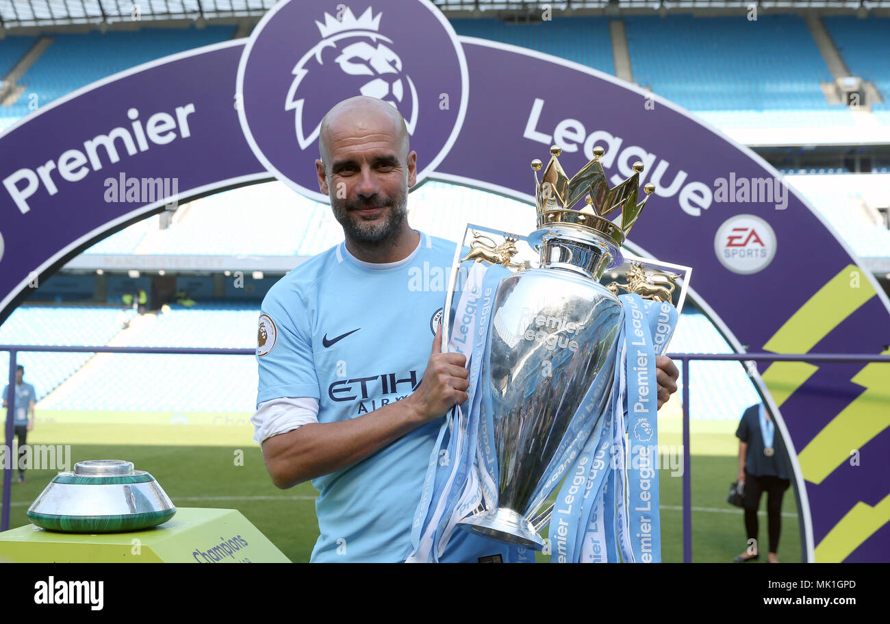 Manchester City manager Pep Guardiola celebrates with the Premier ...