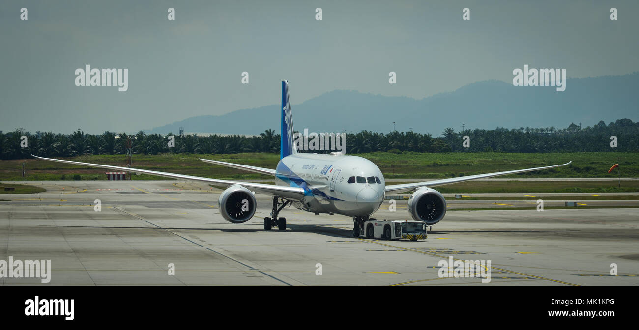 Kuala Lumpur, Malaysia - May 3, 2018. An ANA airplane on runway at ...