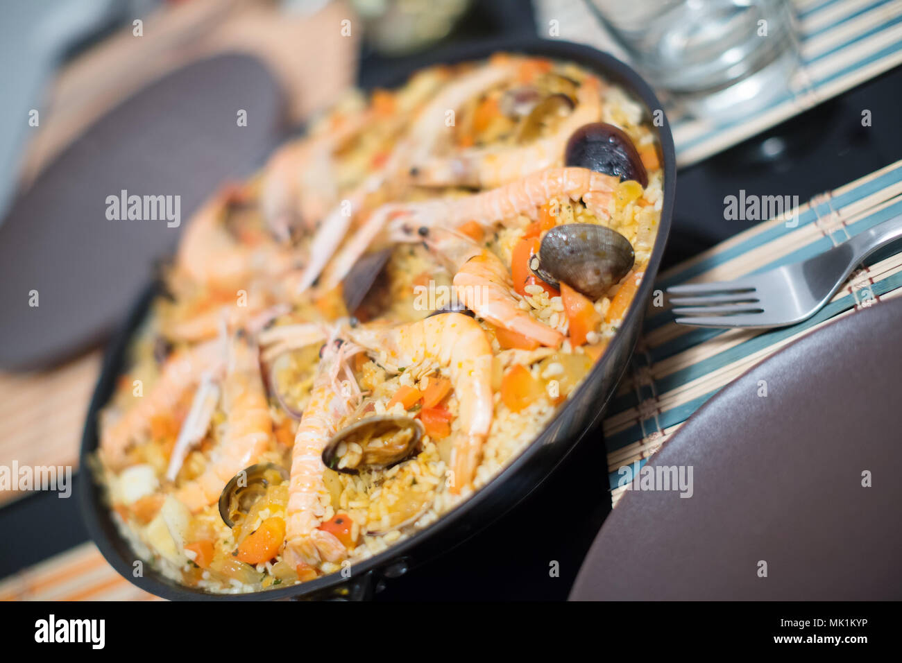 Paella de marisco, seafood dish with rice, shrimps and mussels Stock ...