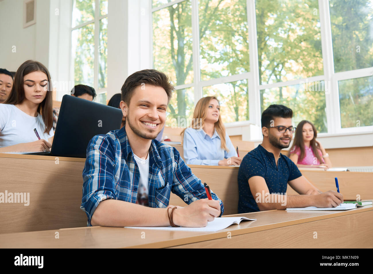 Frontview of studuing during lesson students. Groupmates are ...