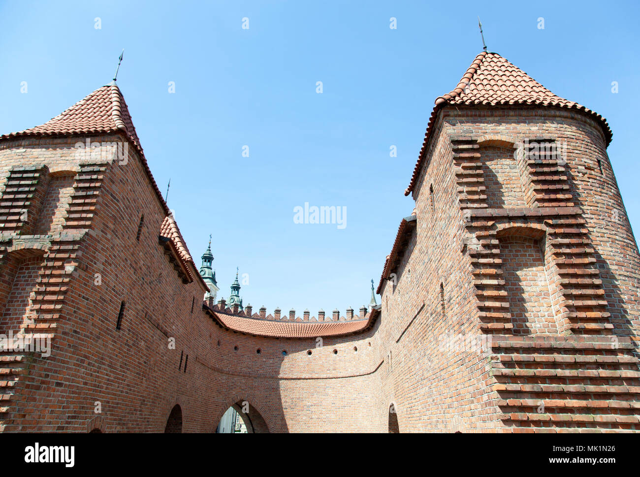 16th century Barbican castle defense wall with towers in Warsaw old ...