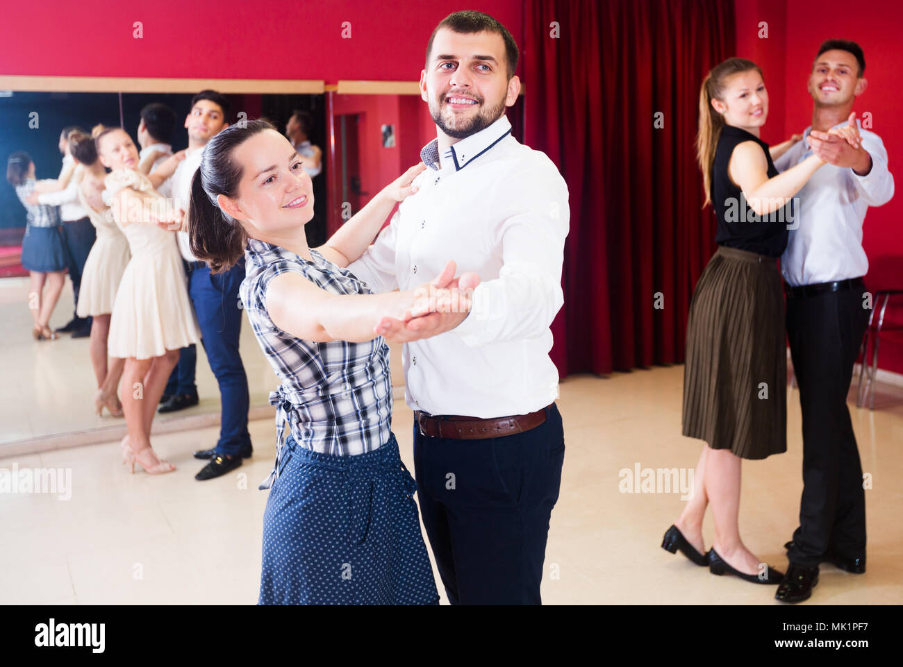Young people dancing together slow ballroom dances in pairs Stock Photo ...