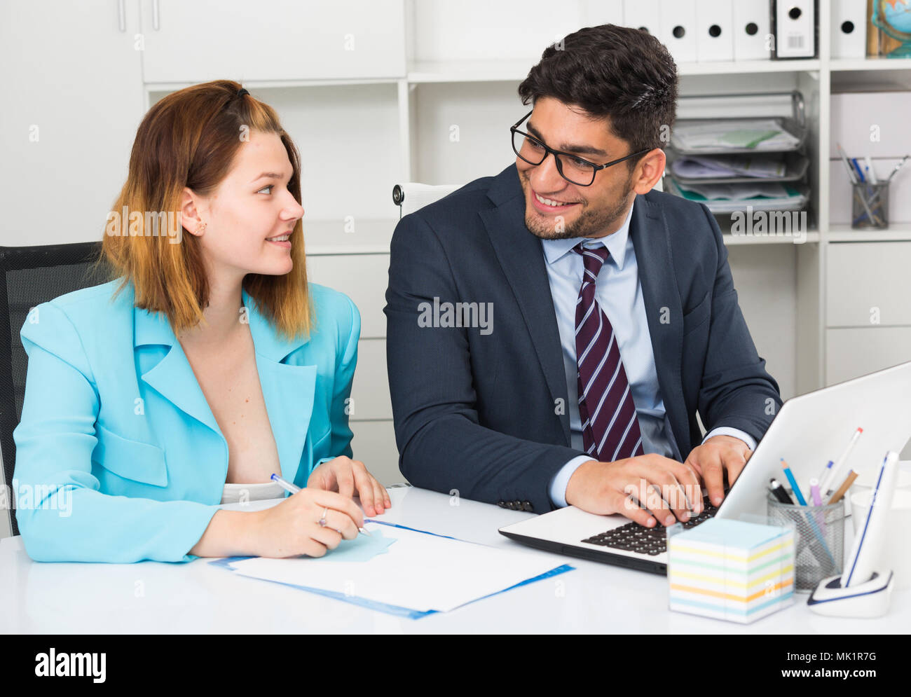 Focused business team working with computer in modern office Stock ...