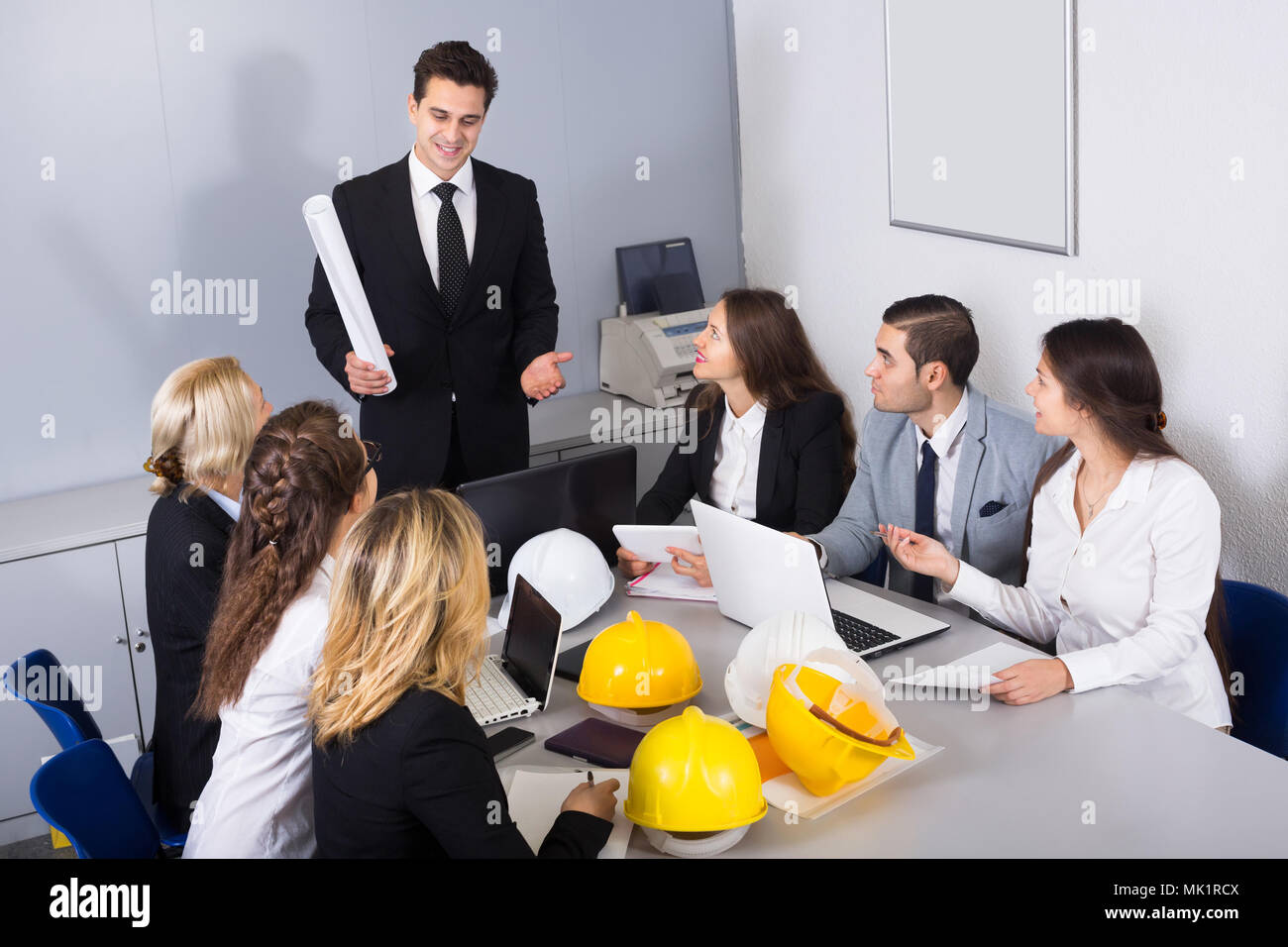Office brainstorming of professional business team at meeting indoor ...