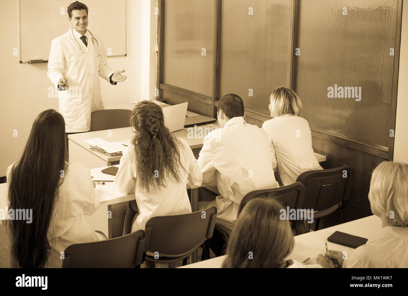 Female professor with medical students hi-res stock photography and ...