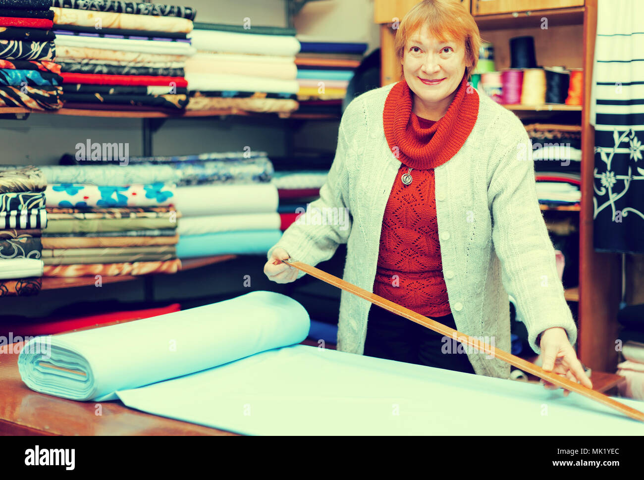 salesclerk works in the tissue store Stock Photo - Alamy