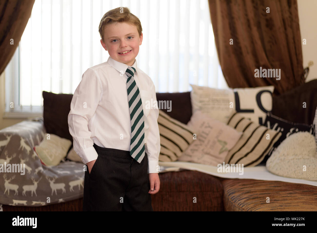 Young boy dressed in new uniform and ready for school Stock Photo - Alamy
