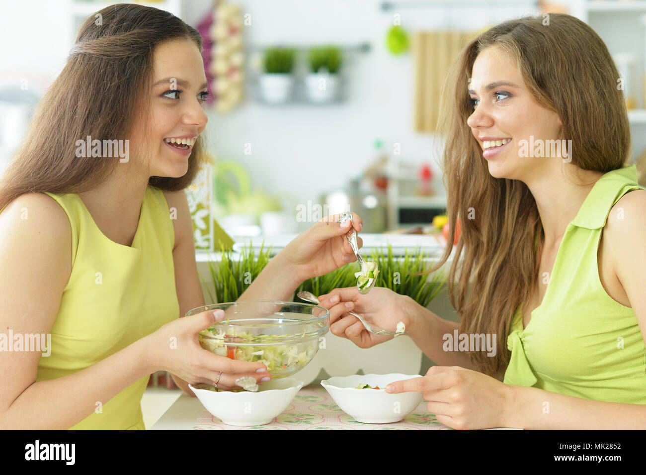 young girls in the kitchen Stock Photo - Alamy