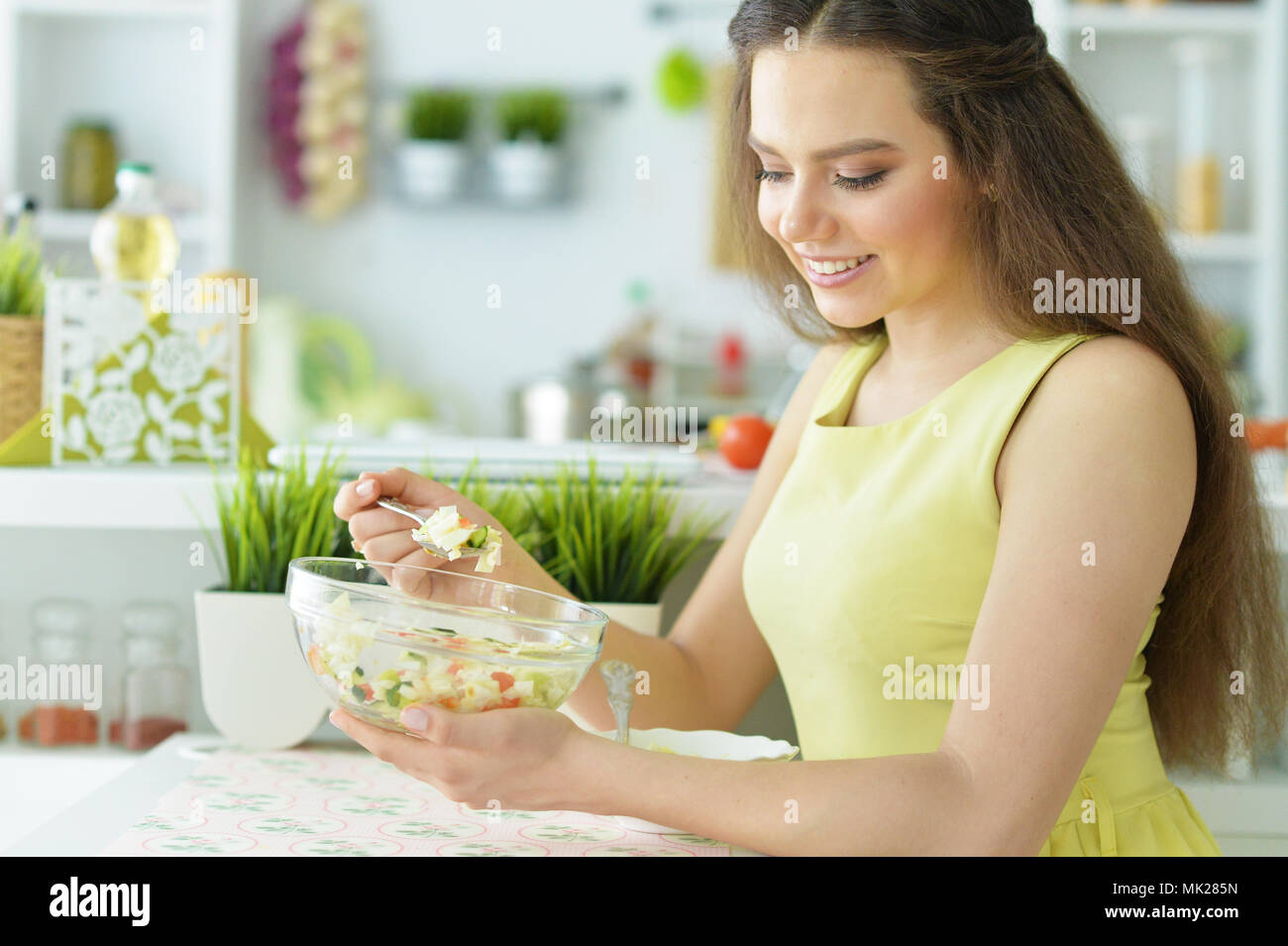 young girl in the kitchen Stock Photo - Alamy