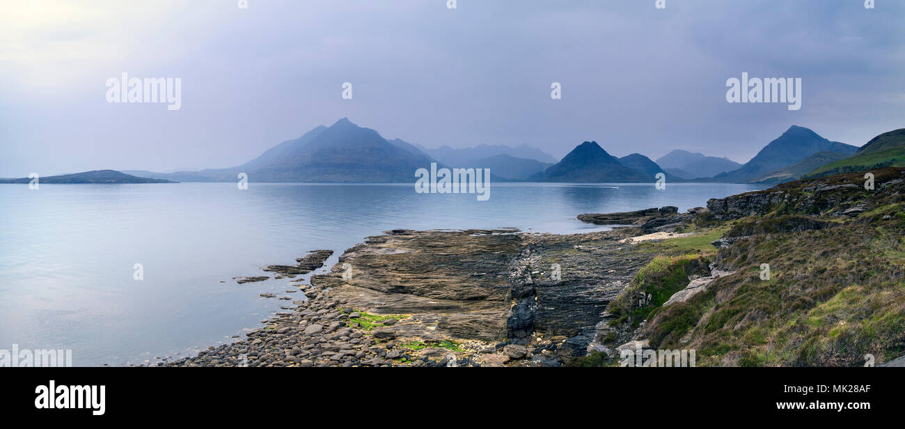 Panoramic view of the Black Cuillin Mountains and Sea Loch Scavaig as ...