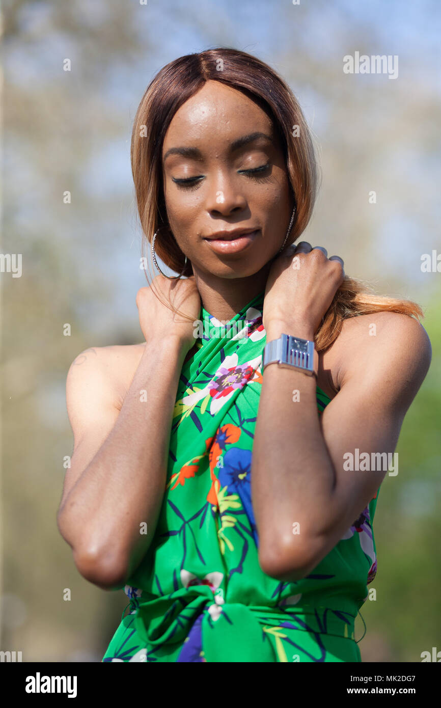 West Indian woman posing clothes Stock Photo - Alamy