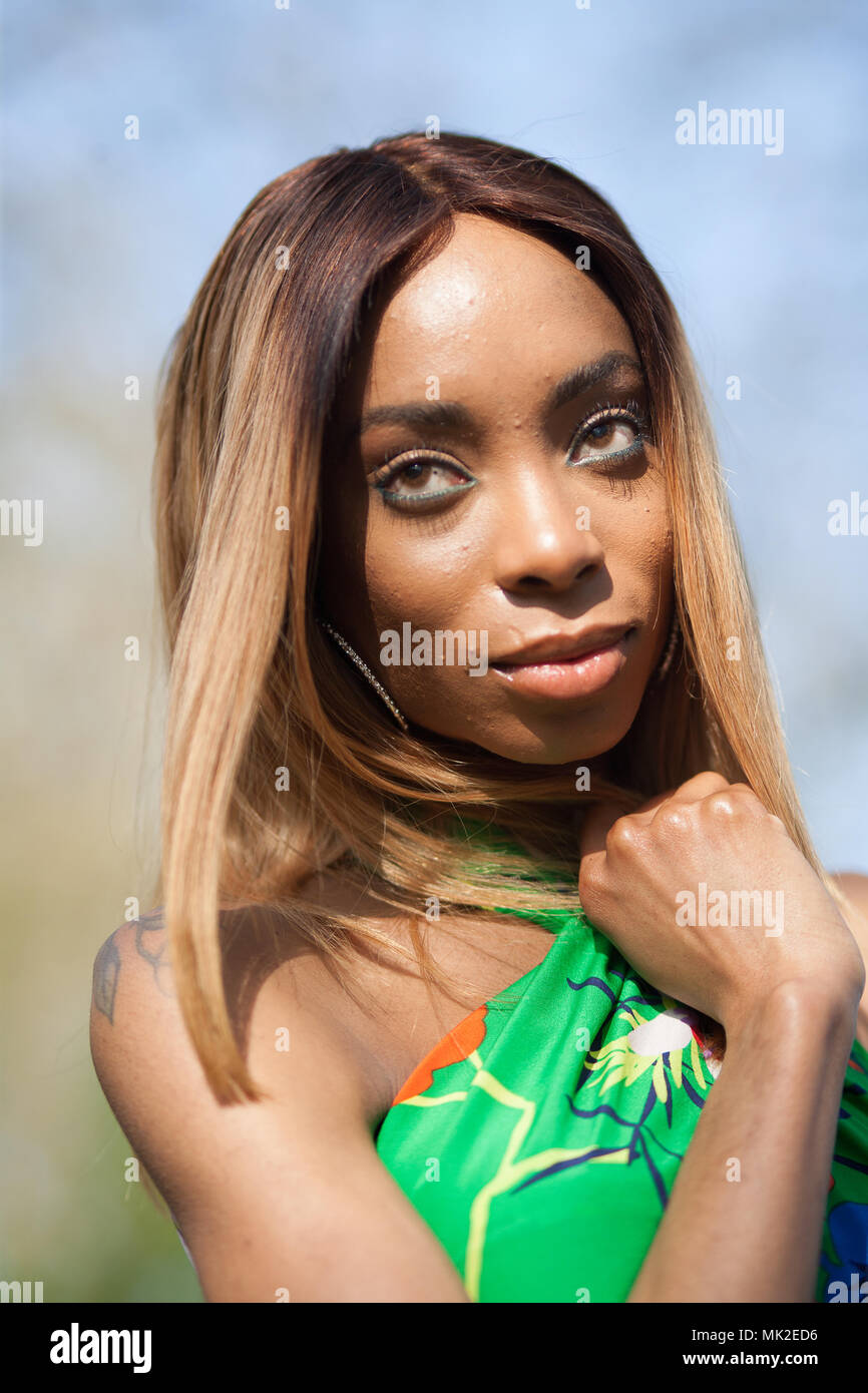 West Indian woman posing clothes Stock Photo - Alamy