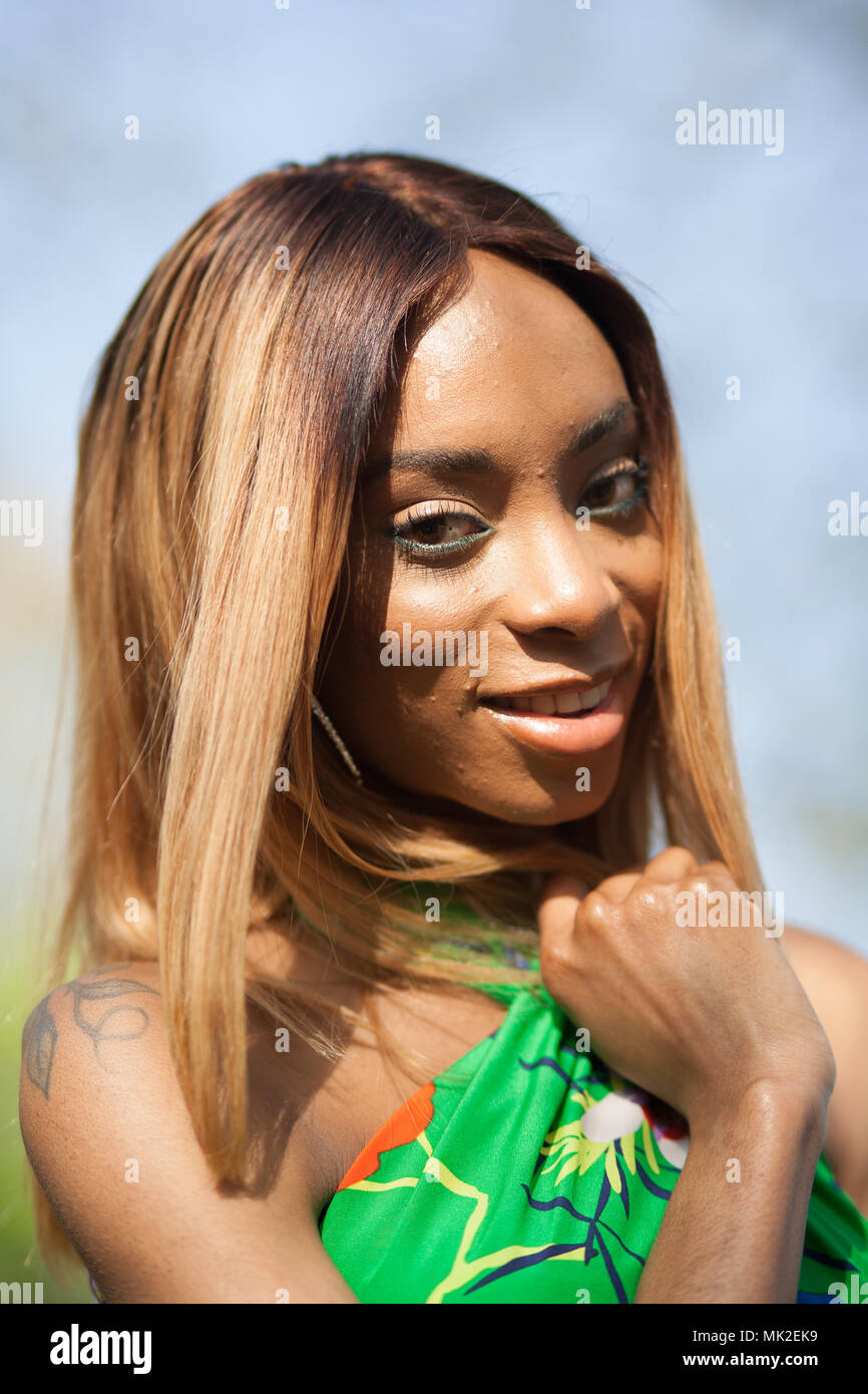 West Indian woman posing clothes Stock Photo - Alamy