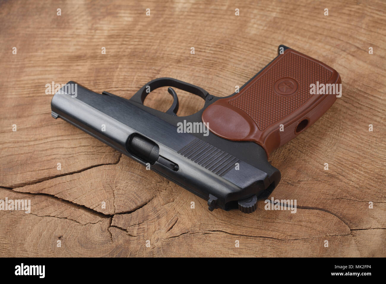 9mm russian handgun on wooden background Stock Photo - Alamy