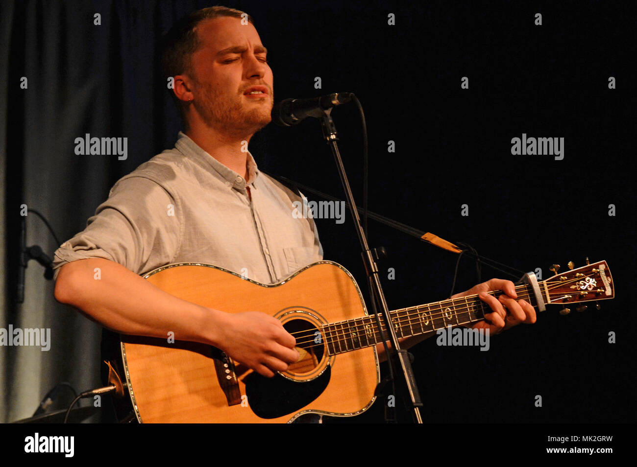 Adam Holmes folk musician playing a solo show at the Carnegie Hall in ...