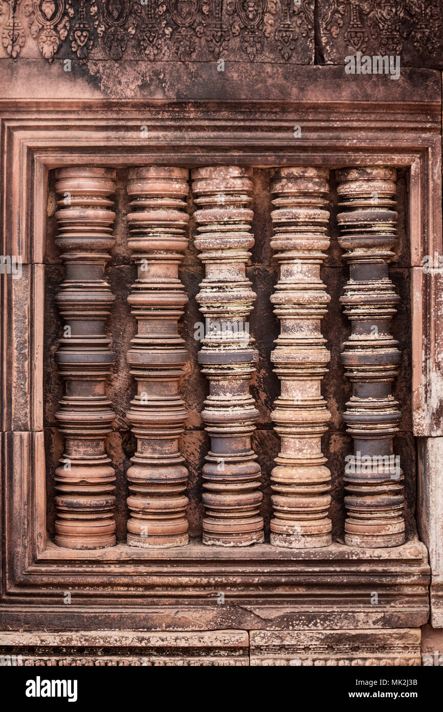 Distinctive Colonette columns on the exterior wall of the Hindu temple ...