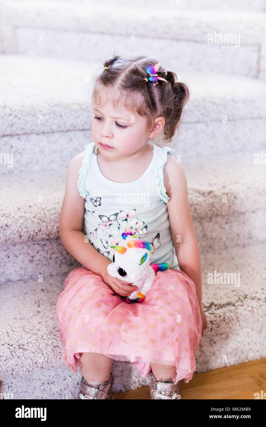 tle girl with her toy in cute pink tutu Stock Photo - Alamy